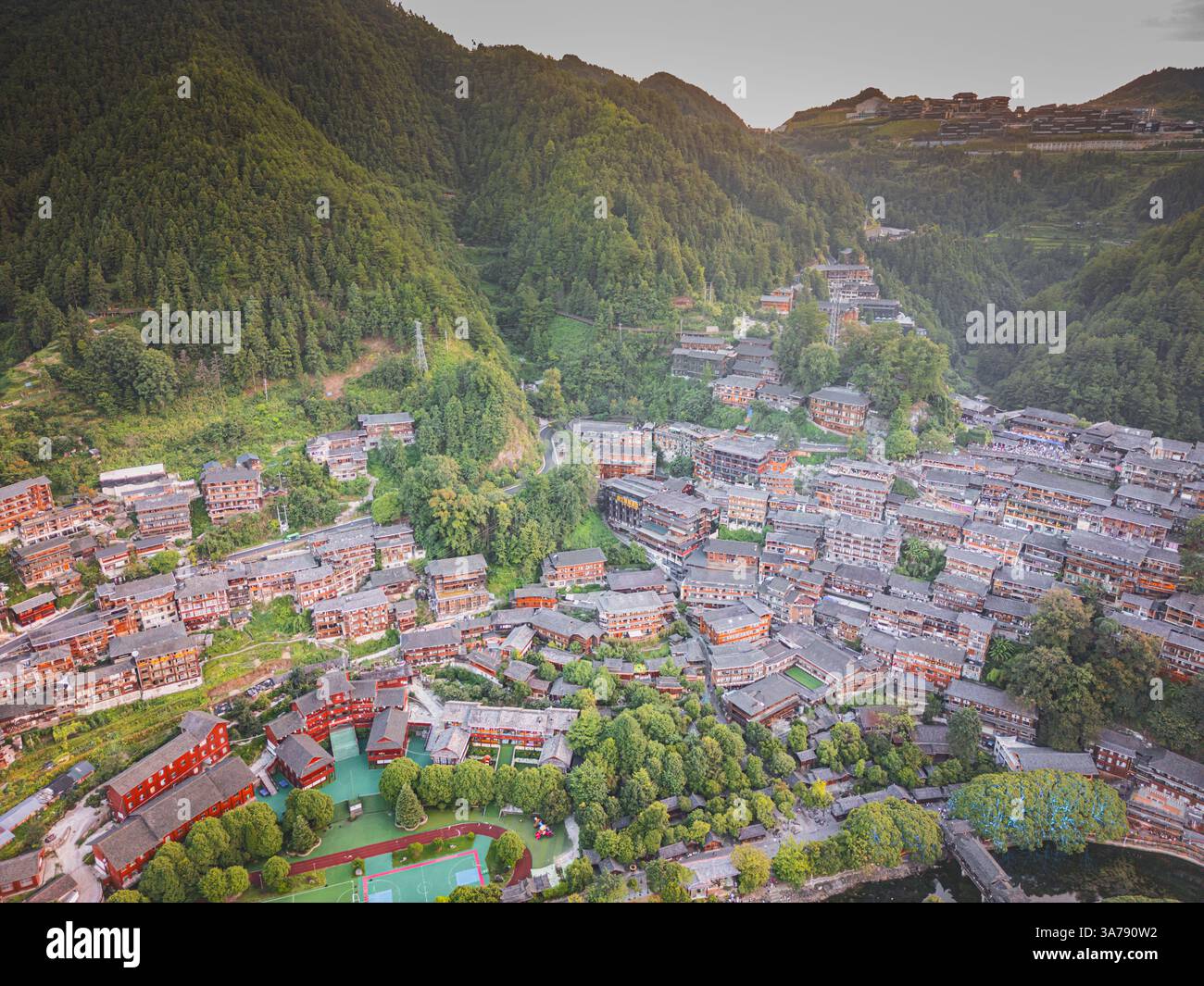Aerial vie on the village surrounded by Rice terraces and limestone ...
