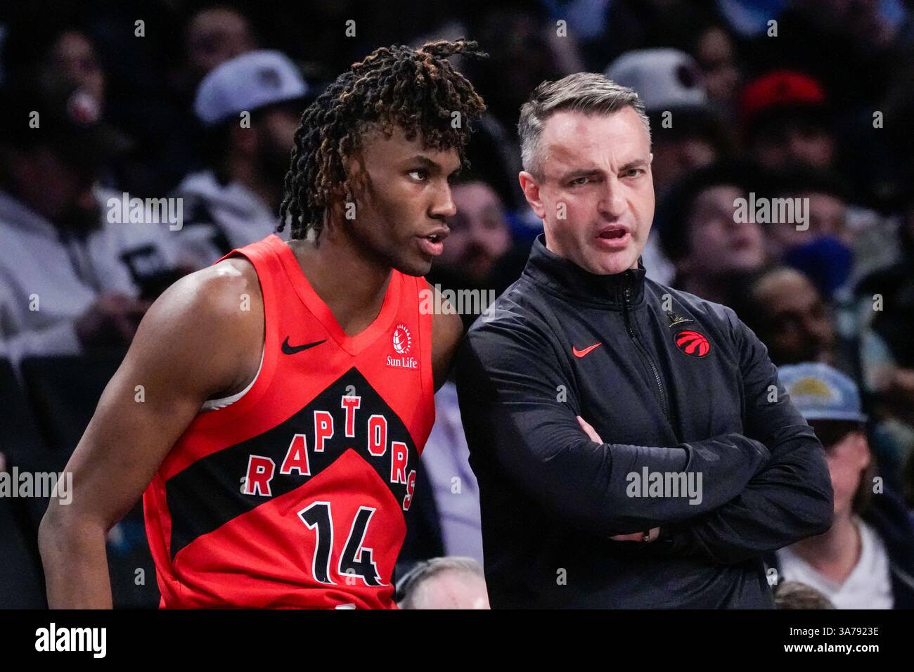 Toronto Raptors head coach Darko Rajakovic speaks with Toronto Raptors ...