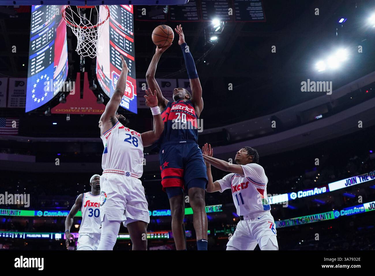 Washington Wizards' Alex Sarr (20) goes up for a shot against ...