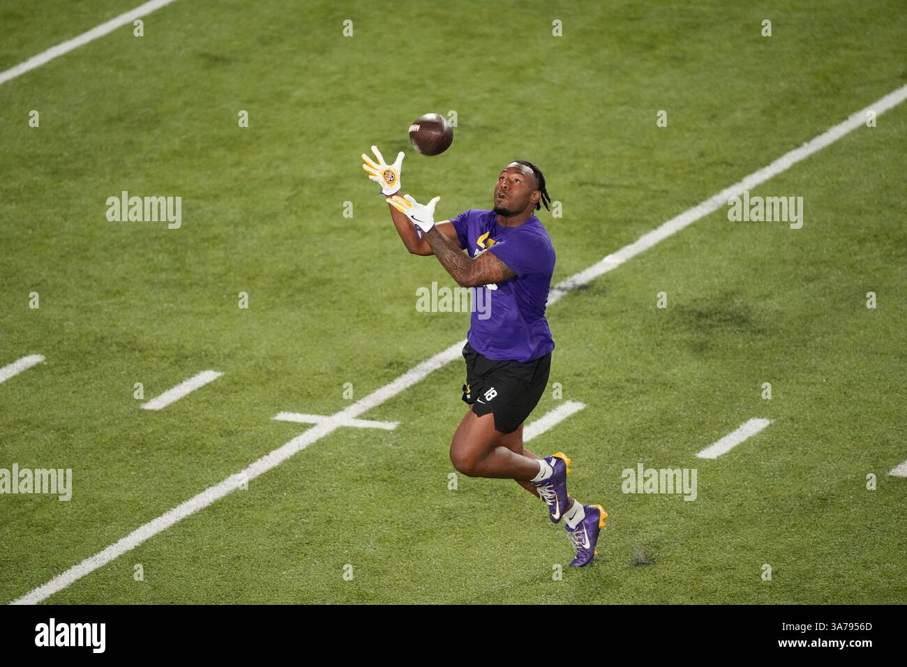 LSU linebacker Greg Penn III runs through drills during the school's ...