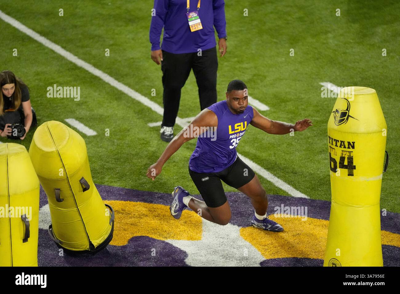 LSU defensive end Sai'vion Jones runs through drills during the school ...