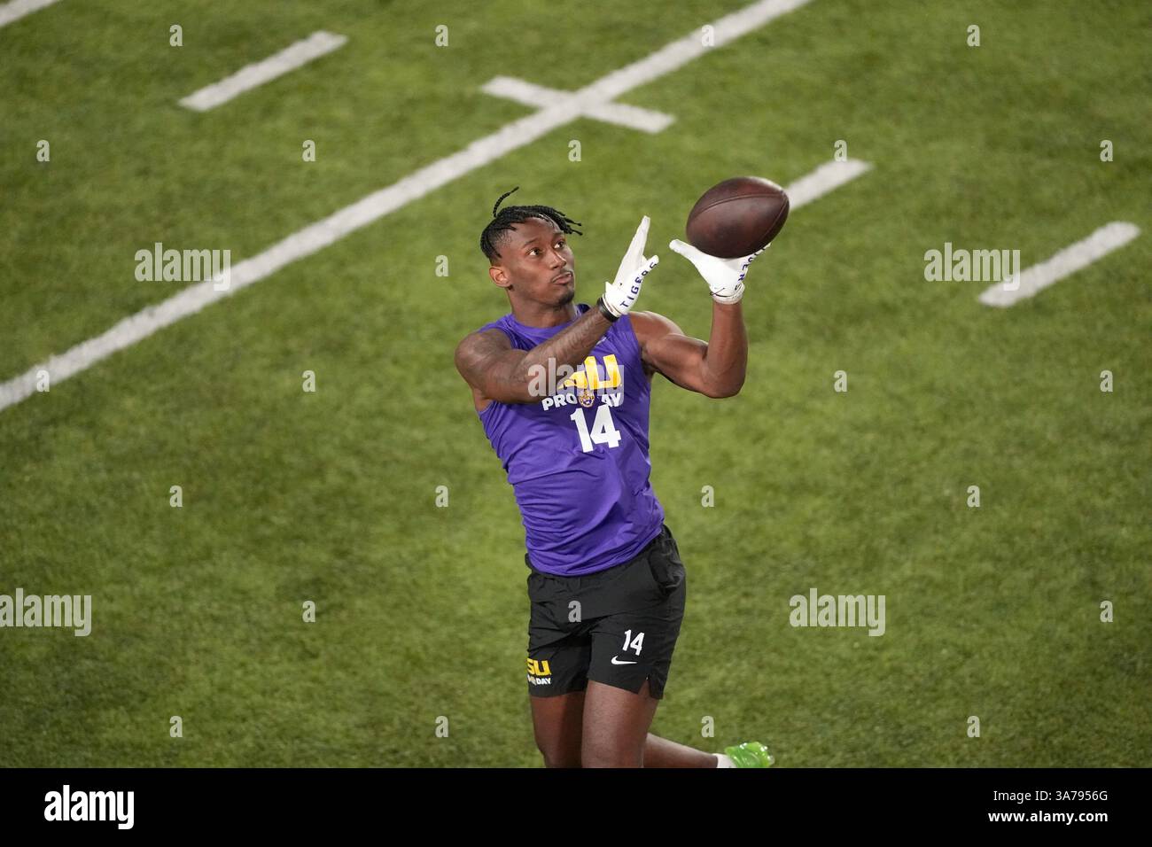 LSU cornerback Zy Alexander (14) runs through drills during the school ...