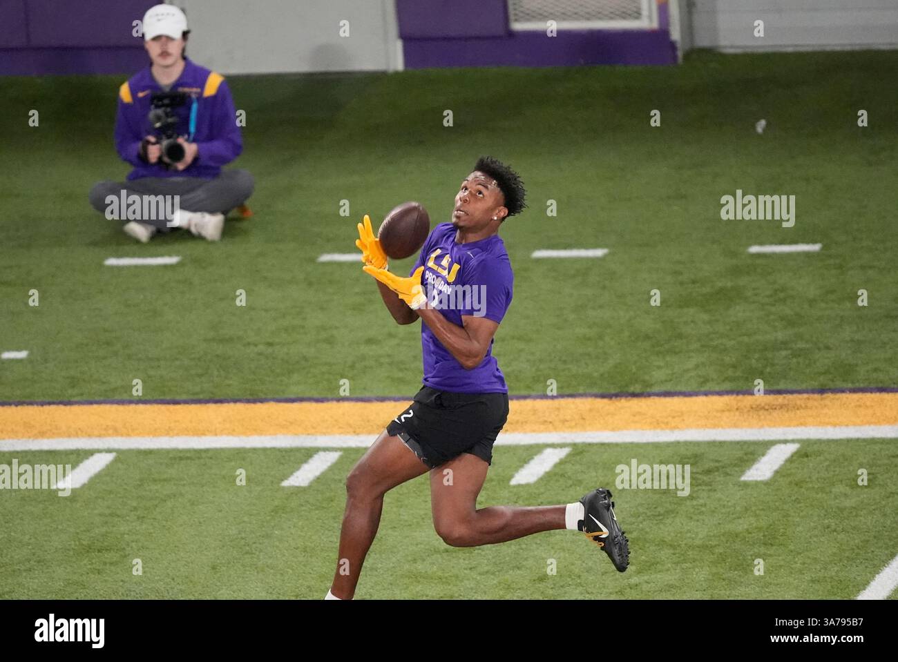LSU wide receiver Kyren Lacy (2) runs through drills during the school ...