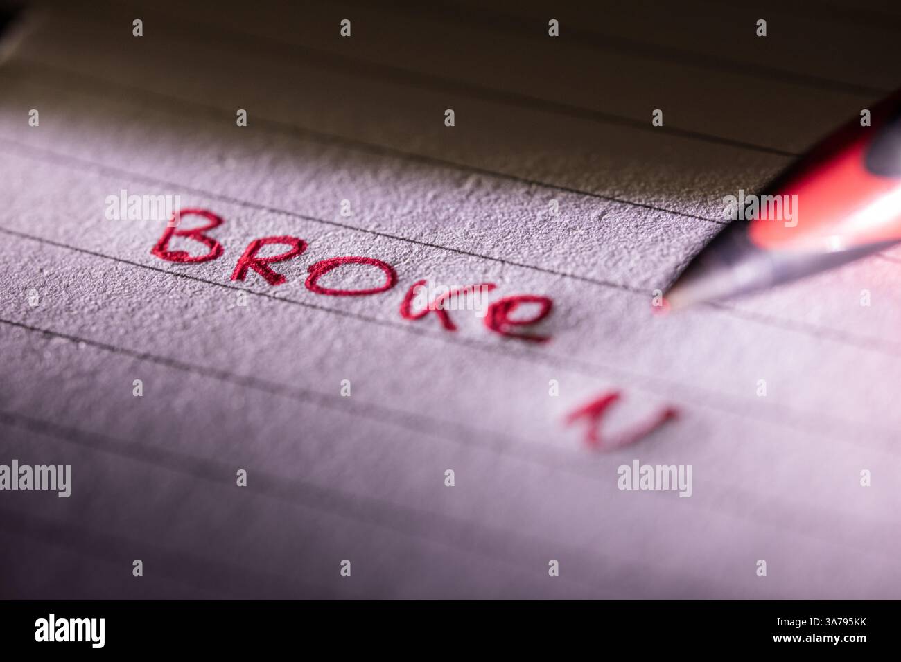 Broken words written at the paper Stock Photo - Alamy
