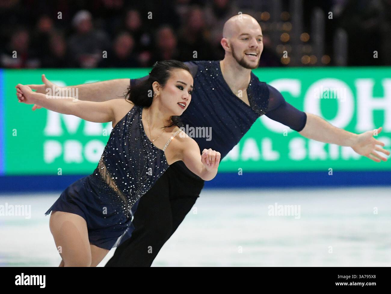 Ellie Kam and Danny O'Shea of the USA perform in the Pairs Short ...