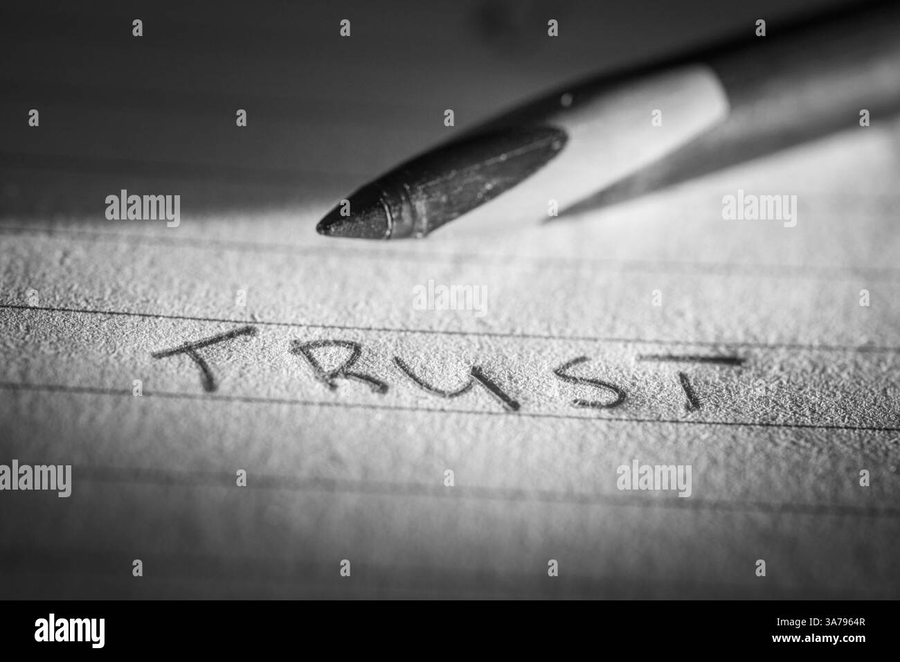 Sign with pen 'trust' Stock Photo - Alamy