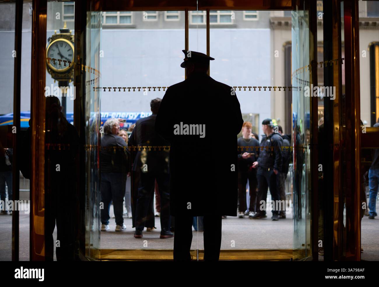 New York, New York, USA. 26th Mar, 2025. A Trump Tower security guard ...