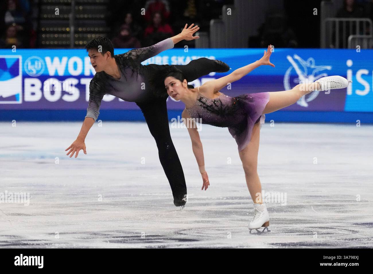Riku Miura and Ryuichi Kihara, of Japan, perform during their pairs ...