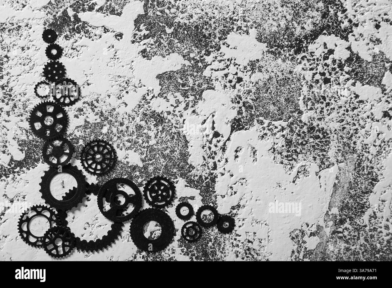 Black paper gears on grunge background Stock Photo - Alamy
