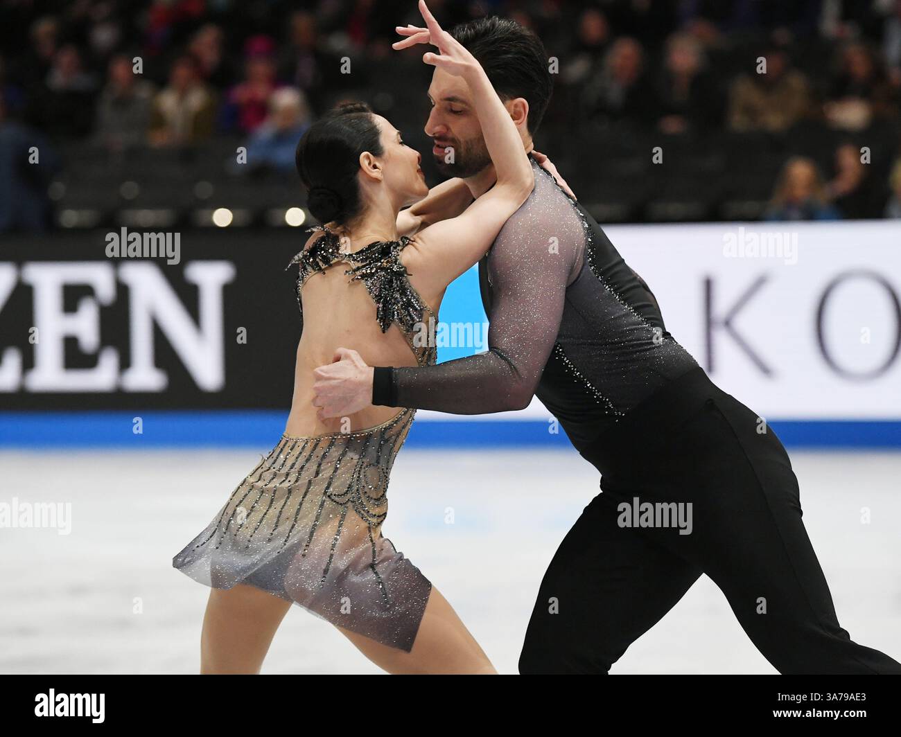 Deanna Stellato-Dudek and Maxime Deschamps of Canada perform in the ...
