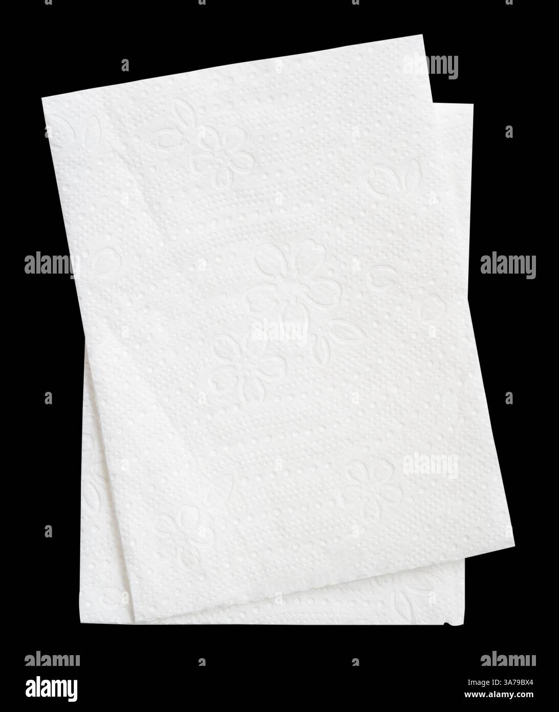 Top view of two folded white tissue paper in stack is isolated on black ...