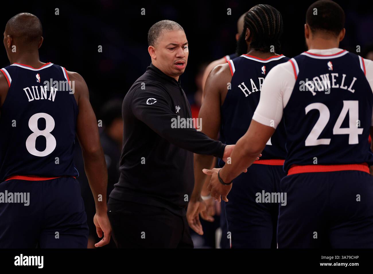 LA Clippers head coach Tyronn Lue reacts with Norman Powell during the ...