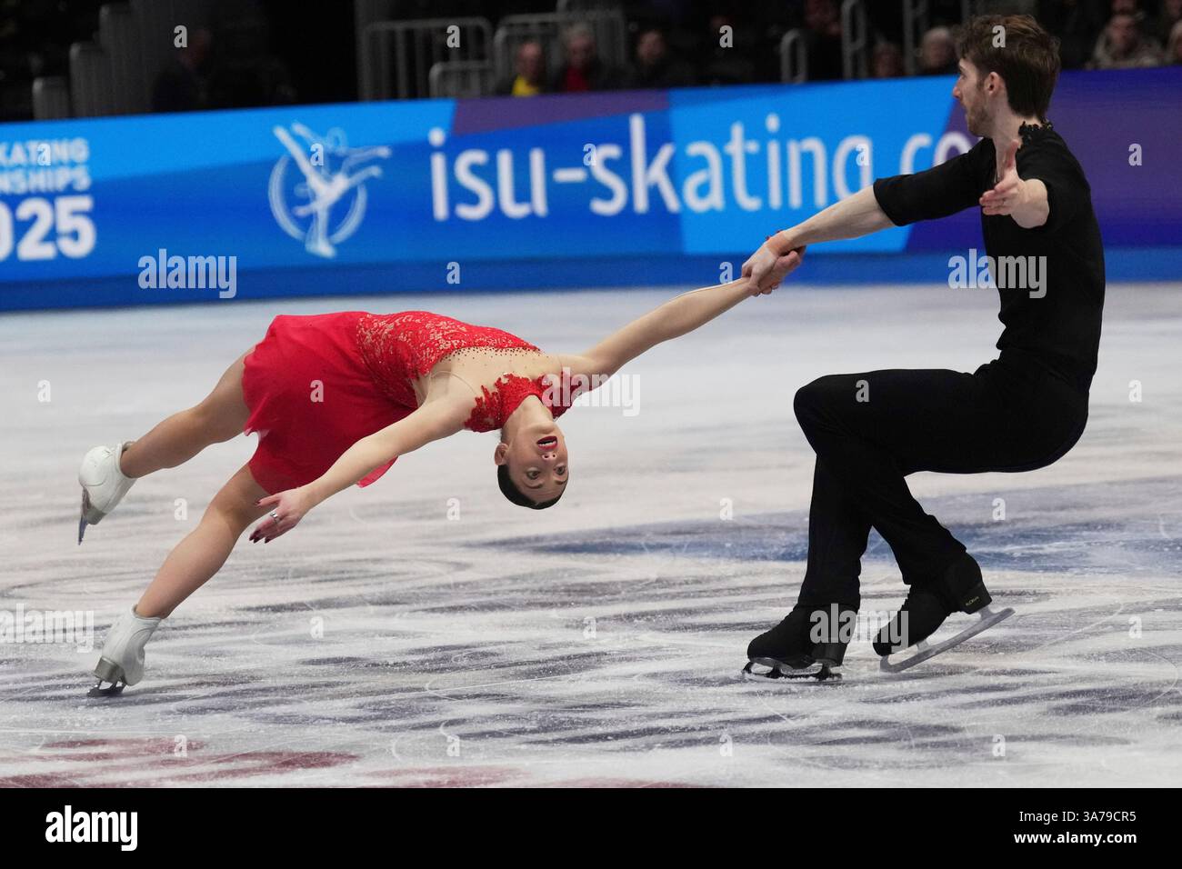 Sara Conti and Niccolo Macii, of Italy, perform during their pairs ...