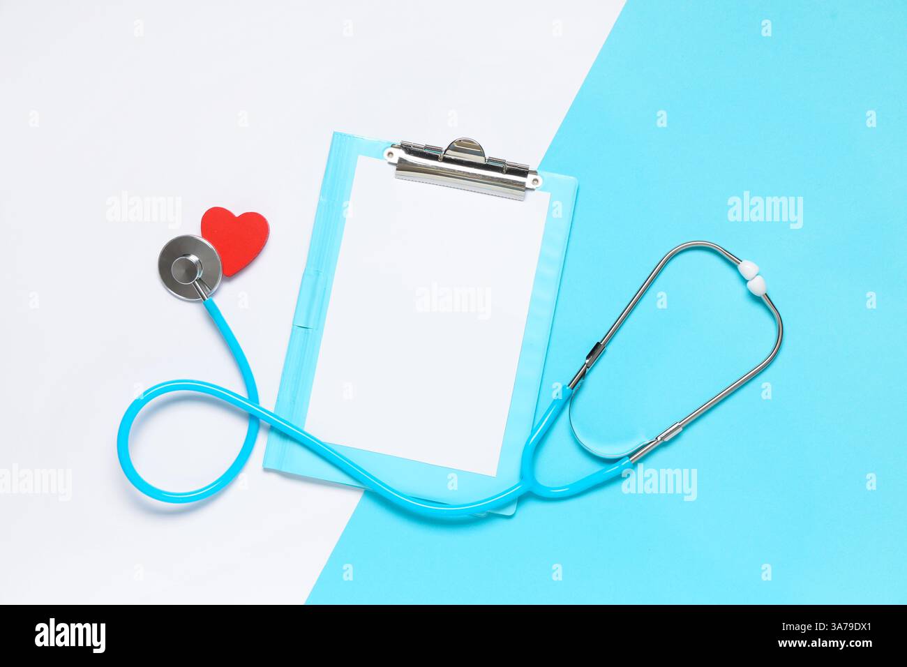 Blank clipboard with stethoscope and red heart on color background ...
