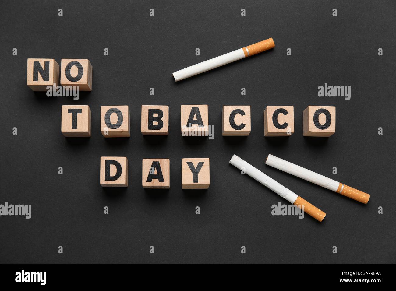 Cubes with text NO TOBACCO DAY and cigarettes on black background Stock ...