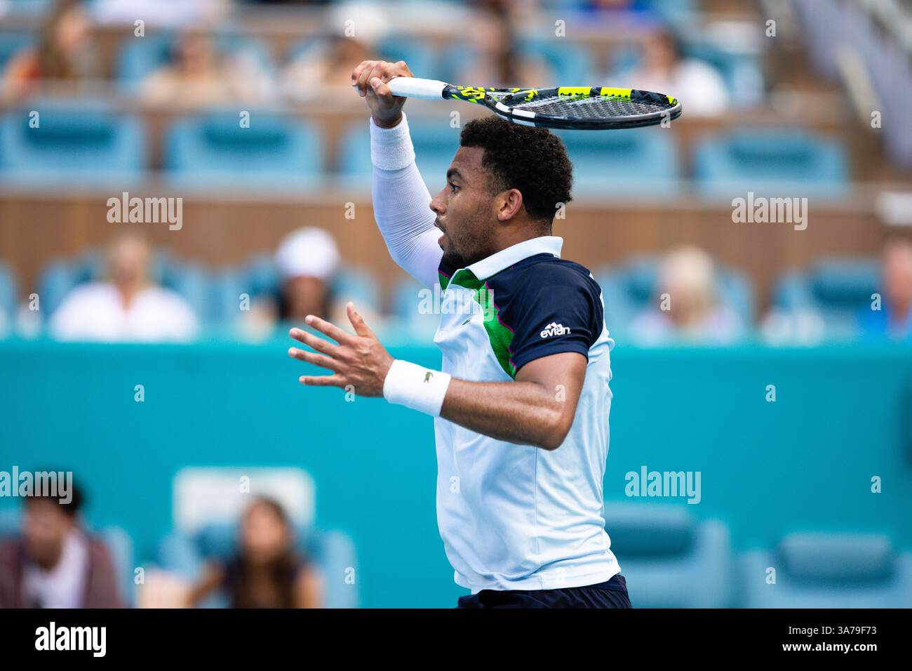 MIAMI GARDENS, FLORIDA - MARCH 26: Arthur Fils of France returns a shot ...