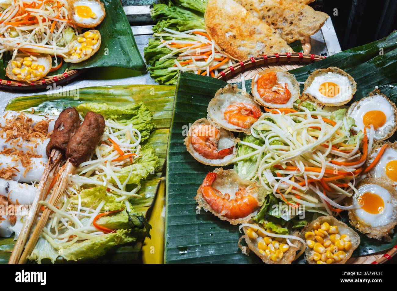 Traditional Vietnamese food on counter at the Asian night market on the ...