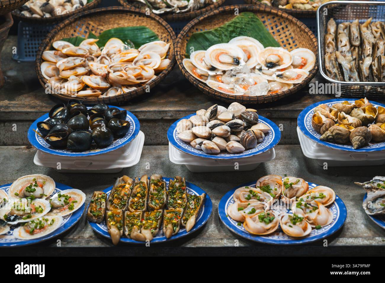 Snails and clams at the Asian Seafood Street food night market in ...