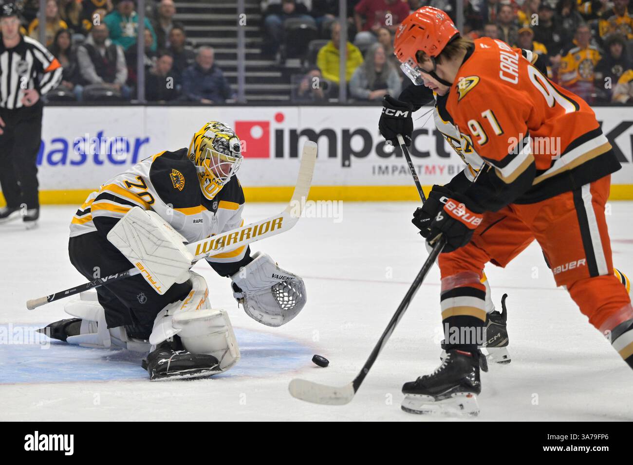 Boston Bruins goaltender Joonas Korpisalo defends a shot by Anaheim ...
