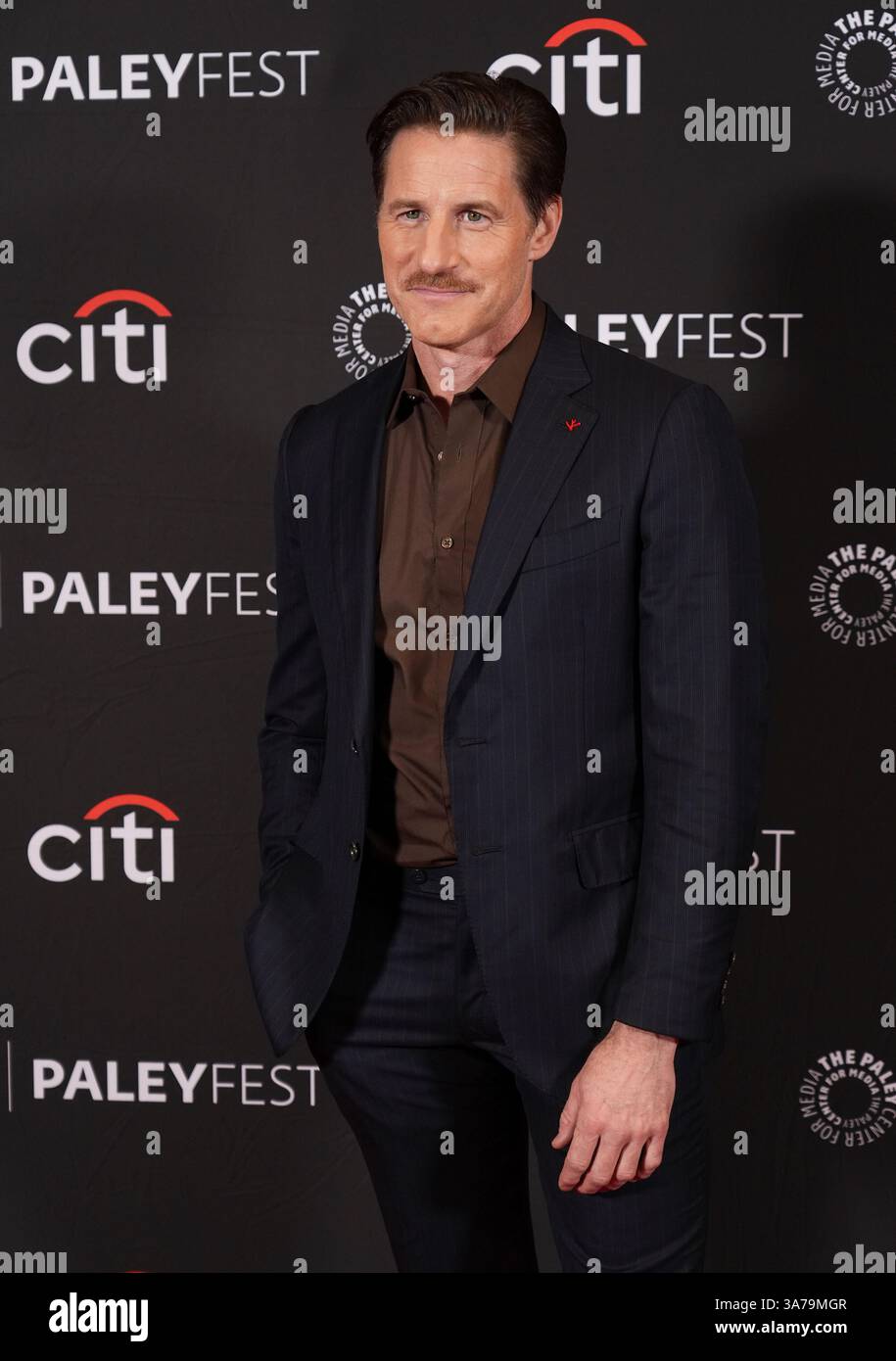 Sam Jaeger poses at a screening of the Hulu television series "The ...