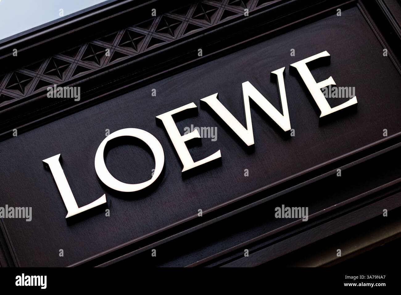 25 March 2025, Bavaria, Munich: The Loewe brand logo and lettering can ...