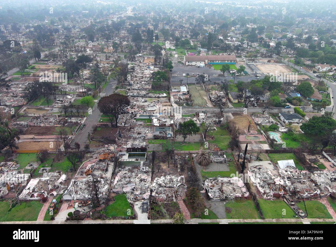 Altadena, United States. 26th Mar, 2025. An aerial view of homes burned ...