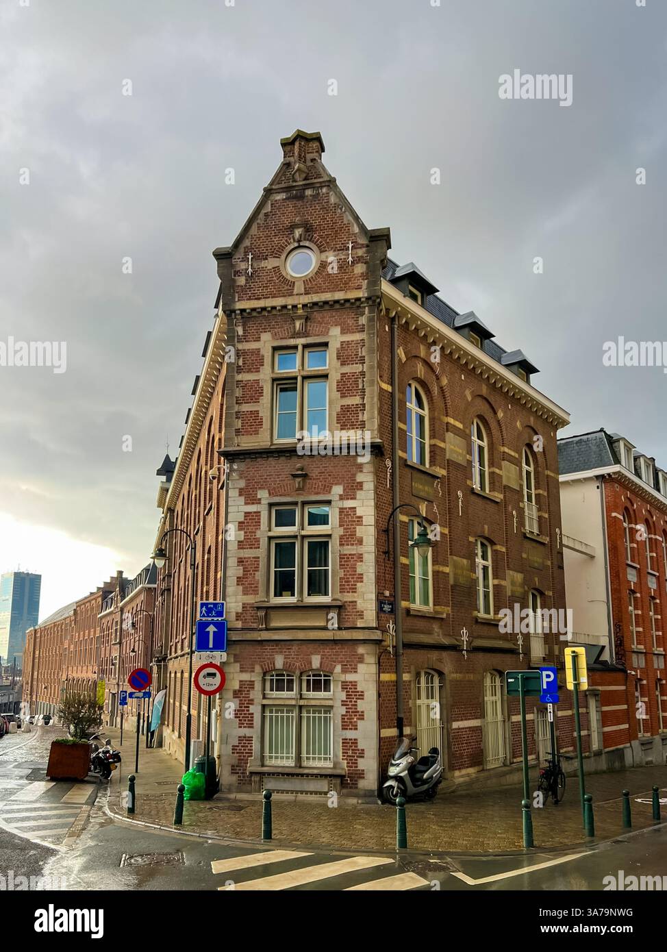 Old three-story building in central Brussels with brown and red brick ...