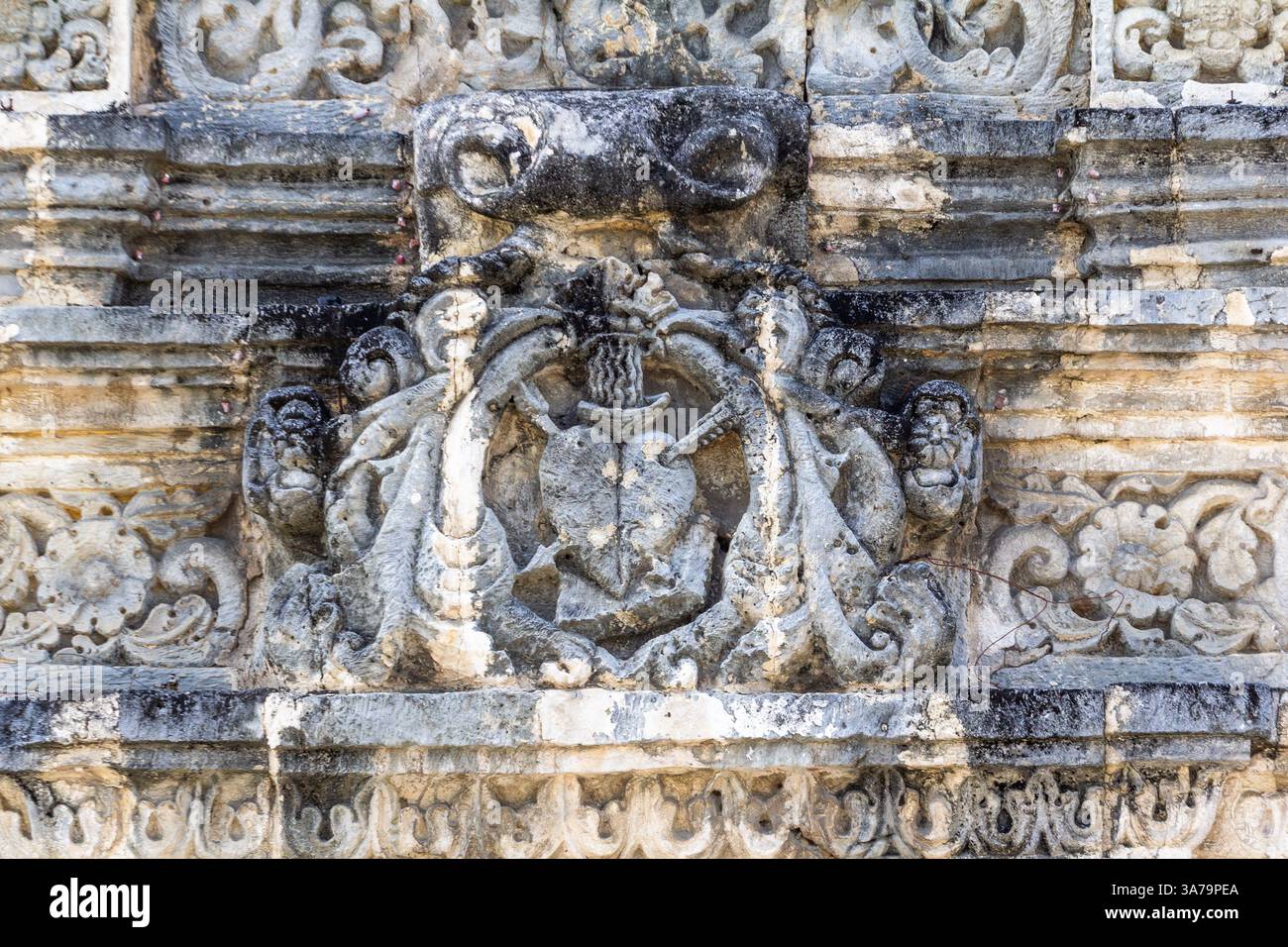 Detail of the richly carved bas relief on the facade of San Juan de ...