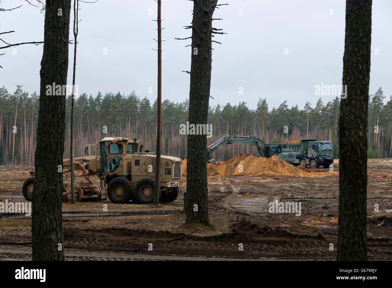 Military road equipment seen working at a training range in Pabrade ...