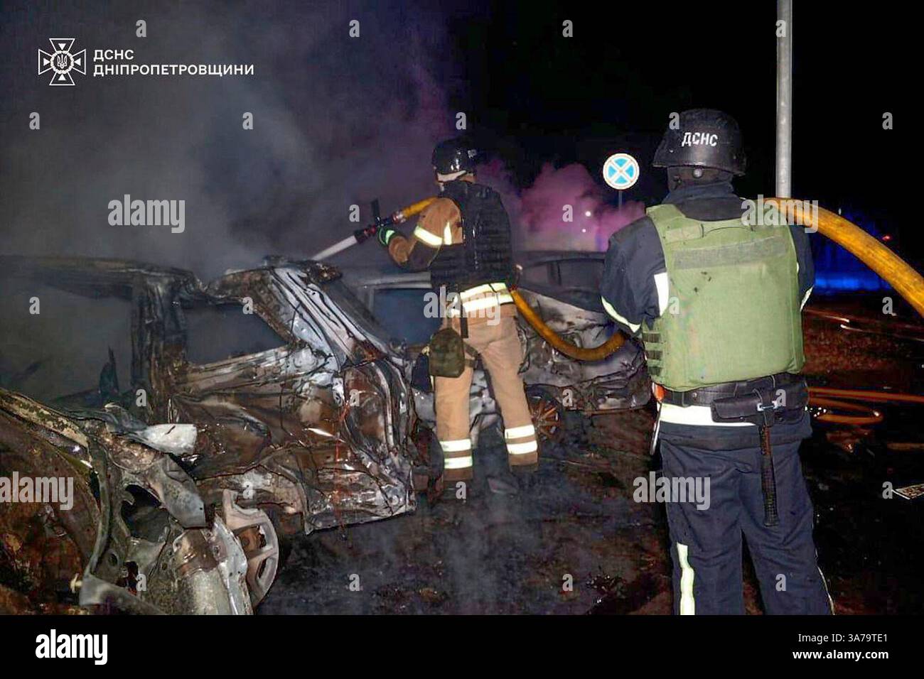 In this photo provided by the Ukrainian Emergency Service, firefighters ...
