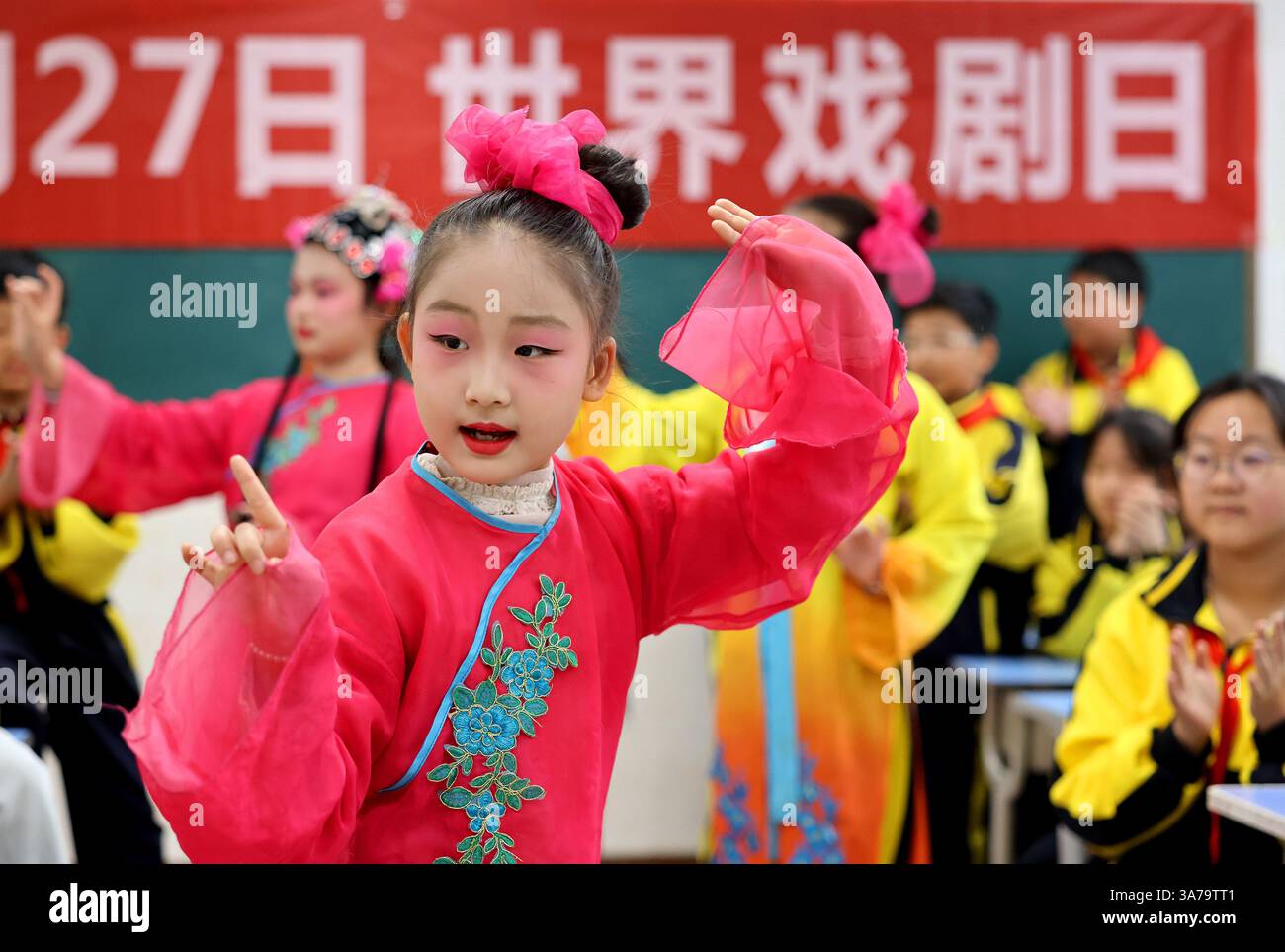 ZAOZHUANG, CHINA - MARCH 27, 2025 - Primary school students perform ...