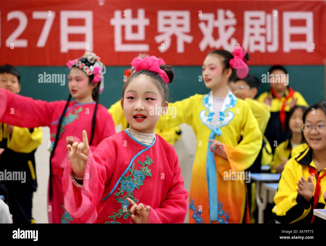 ZAOZHUANG, CHINA - MARCH 27, 2025 - Primary school students perform ...