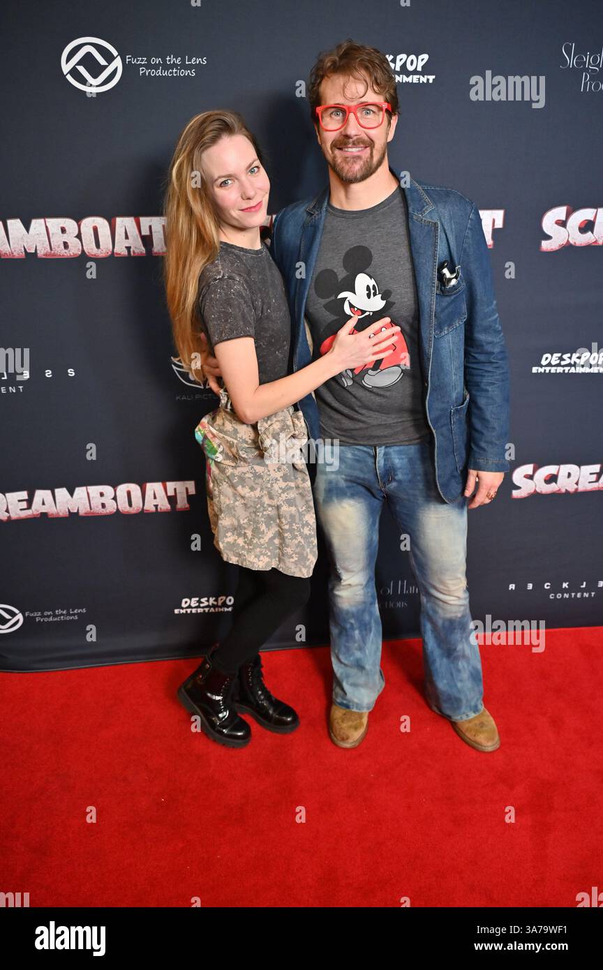 Hollywood, CA USA - March 26, 2025: Chloe Lanier, Josh Kelly attends ...