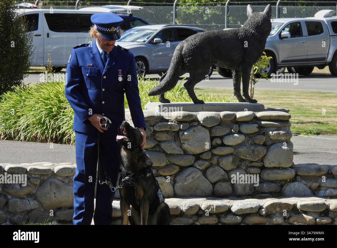 New Zealand Police dog handler Senior Constable Cam Gunn and his patrol ...