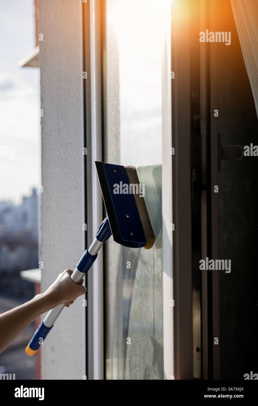 Hand Washing Window. Concept for home cleaning services Stock Photo - Alamy