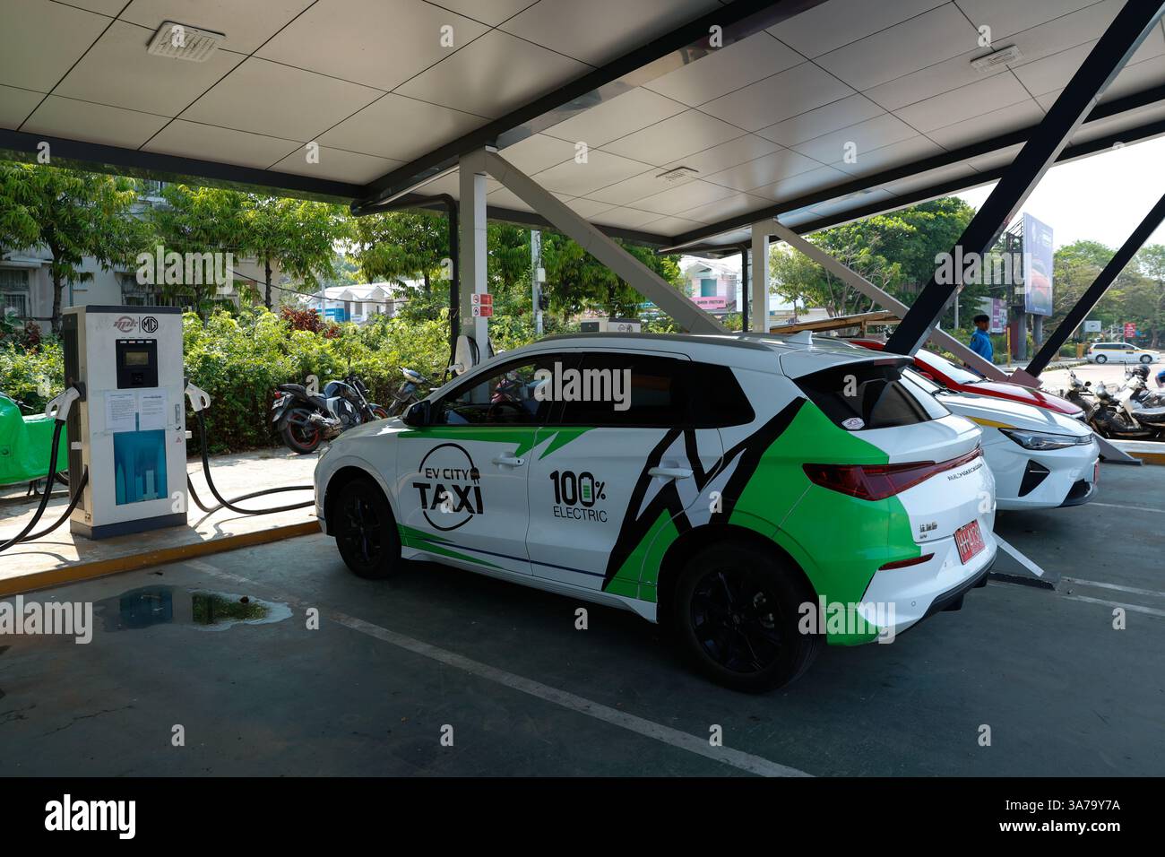 Nay Pyi Taw, Myanmar. 27th Mar, 2025. An electric vehicle (EV) taxi is seen at a charging ...