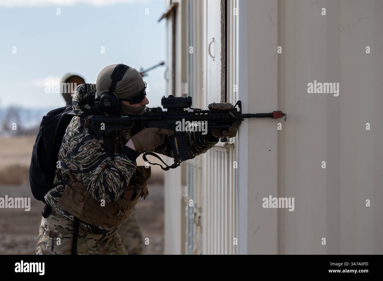 U.S. Air Force Senior Airman Blake Ash, assigned to the 366th Security Forces Squadron, acts as ...