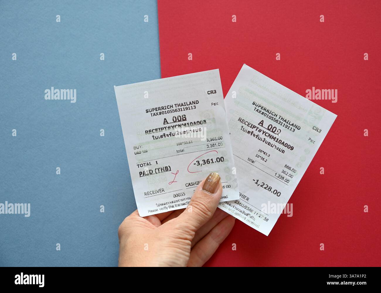 Bangkok currency exchange receipts on contrast background Stock Photo ...