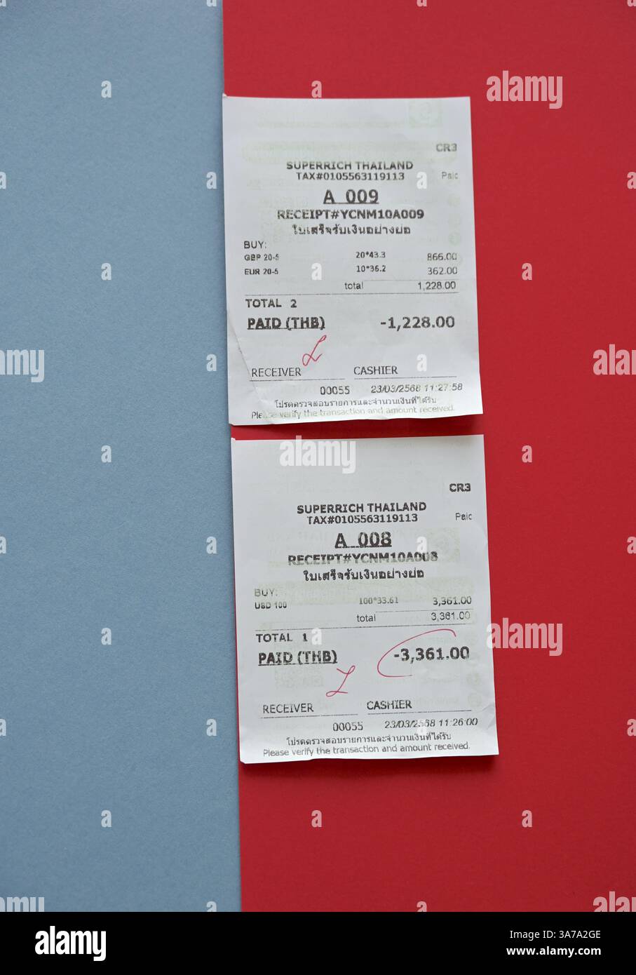 Bangkok currency exchange receipts on contrast background Stock Photo ...