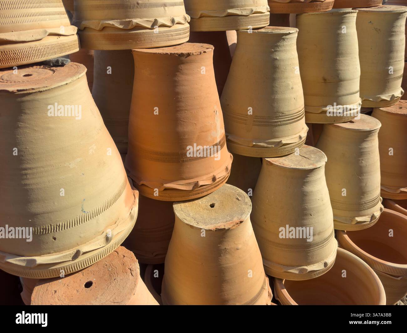 Clay Flowerpots Upside Down in a Store Stock Photo - Alamy