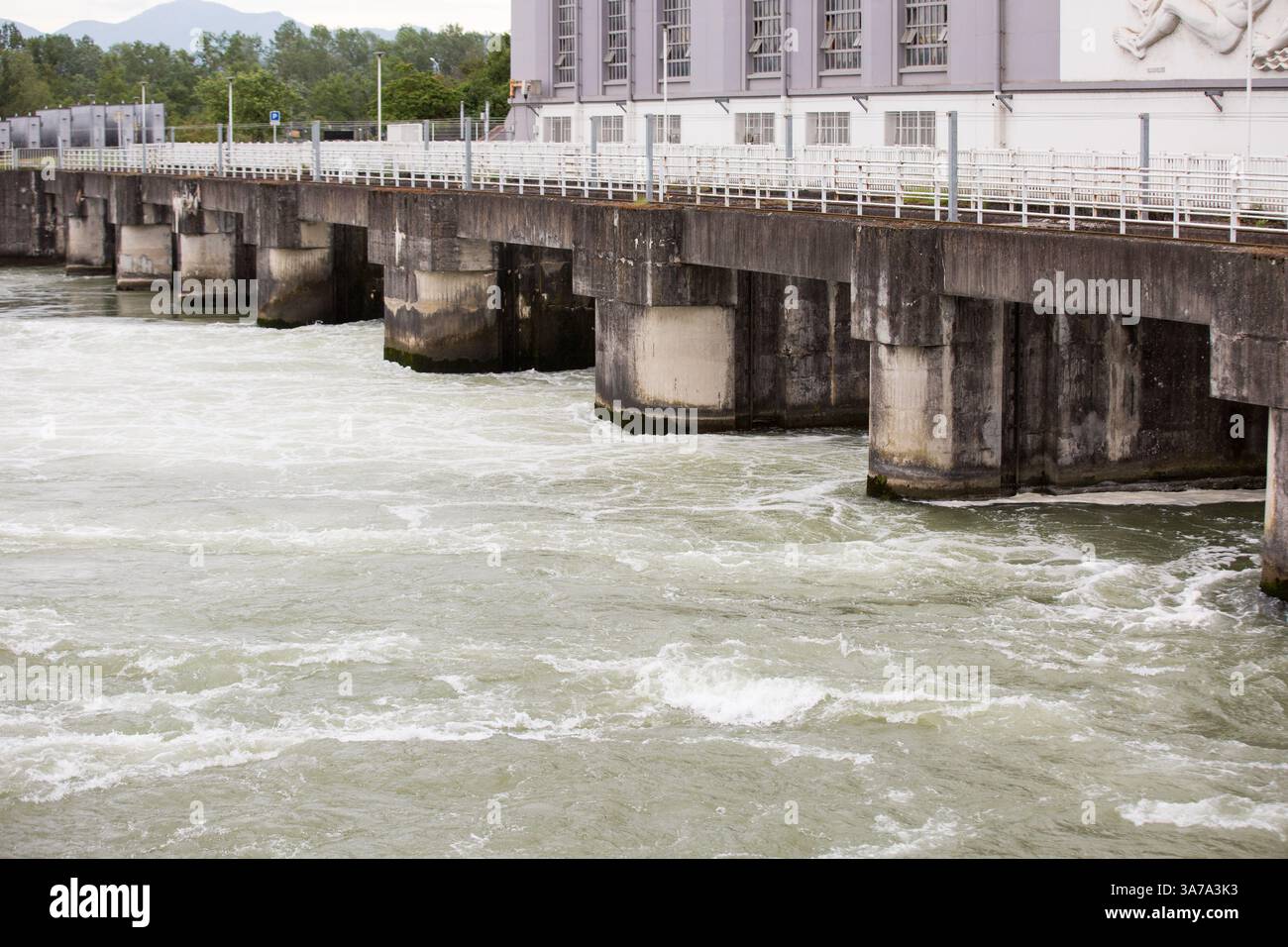 Water flowing through a hydroelectric power plant. The hydroelectric ...
