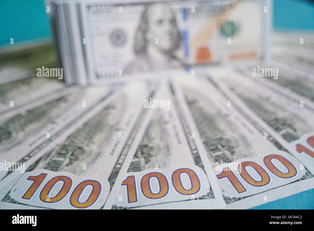 The dollar bills are spread out on the table Stock Photo - Alamy