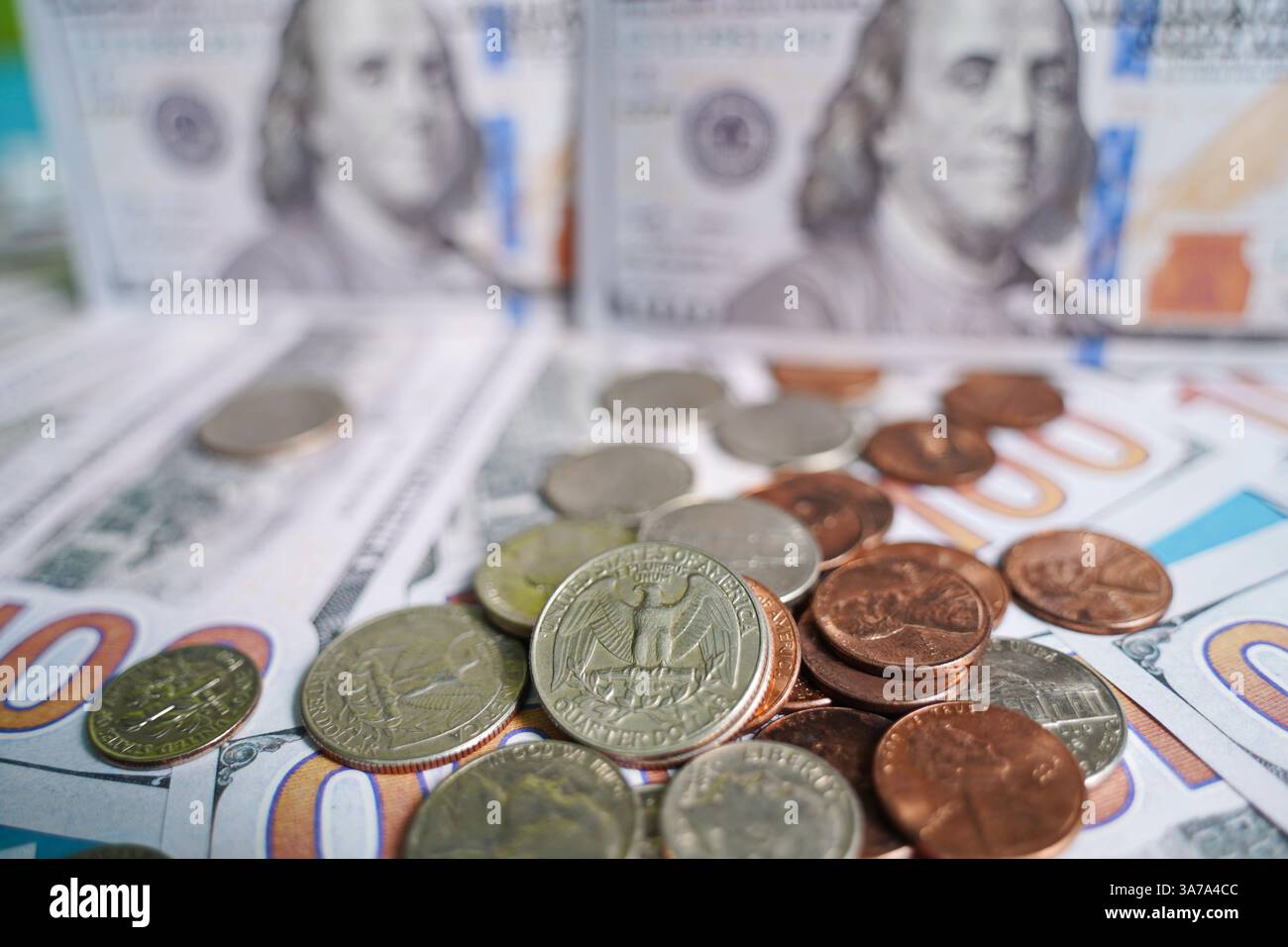 The coins and dollar bills are spread out on the table Stock Photo - Alamy
