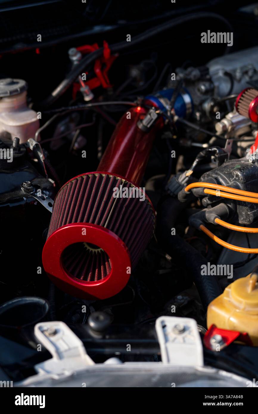 An air filter in a high-speed sports car engine, capturing the essence ...