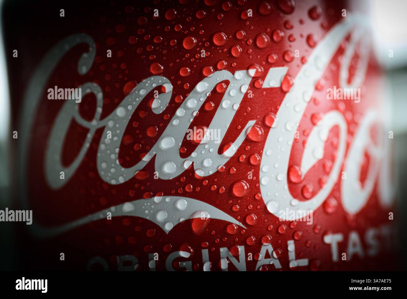 VLADIVOSTOK, RUSSIA - MARCH 21, 2025: Coca-Cola logo with water drops ...