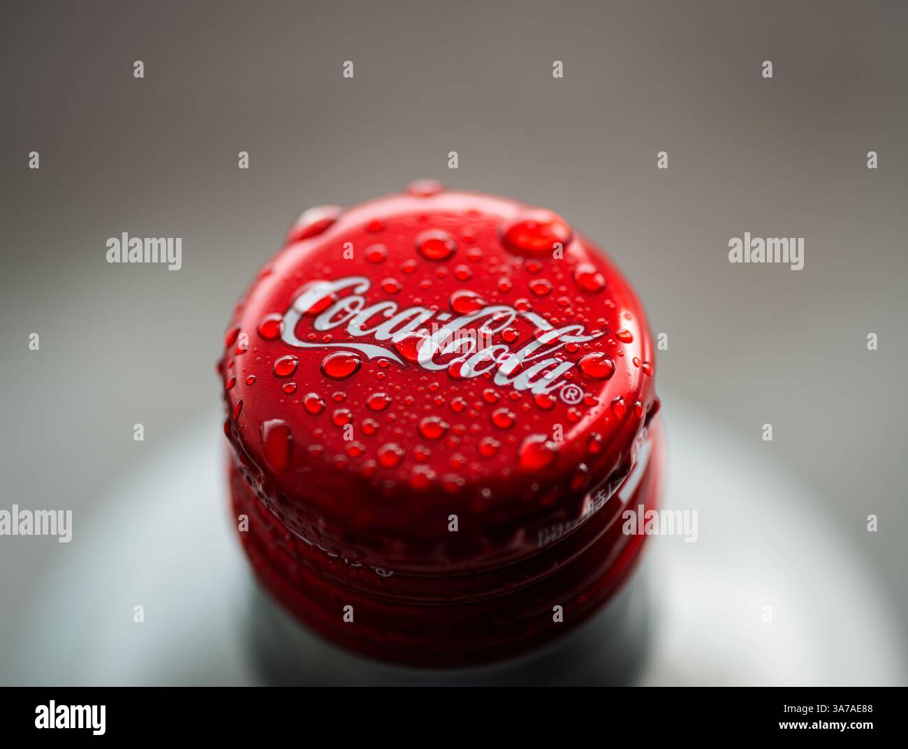 VLADIVOSTOK, RUSSIA - MARCH 21, 2025: Coca-Cola lid with water drops ...