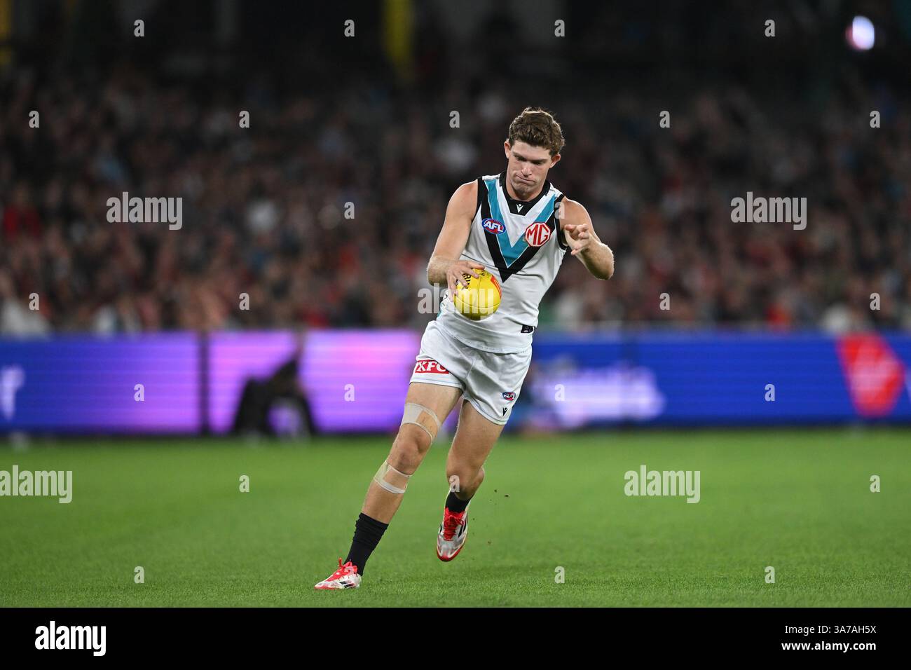 Melbourne, Australia. 27th Mar, 2025. Mitch Georgiades of Port Adelaide ...