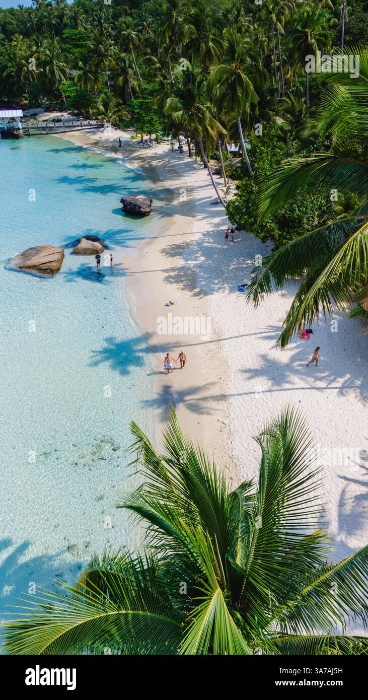 Experience the breathtaking aerial view of Koh Kood Islands pristine beaches, showcasing ...