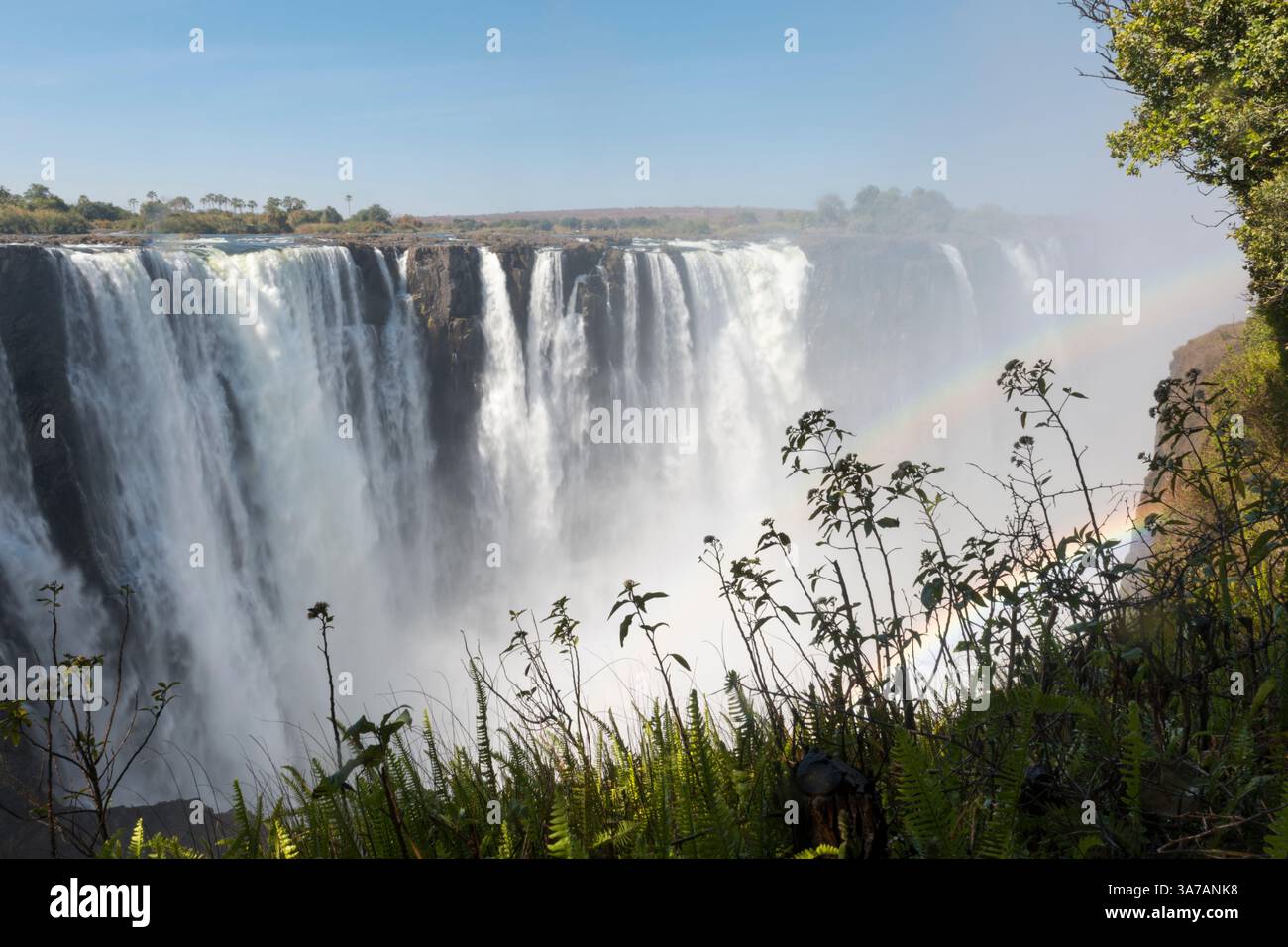 Waterfall rainbow at Victoria Falls as seen from Victoria Falls ...