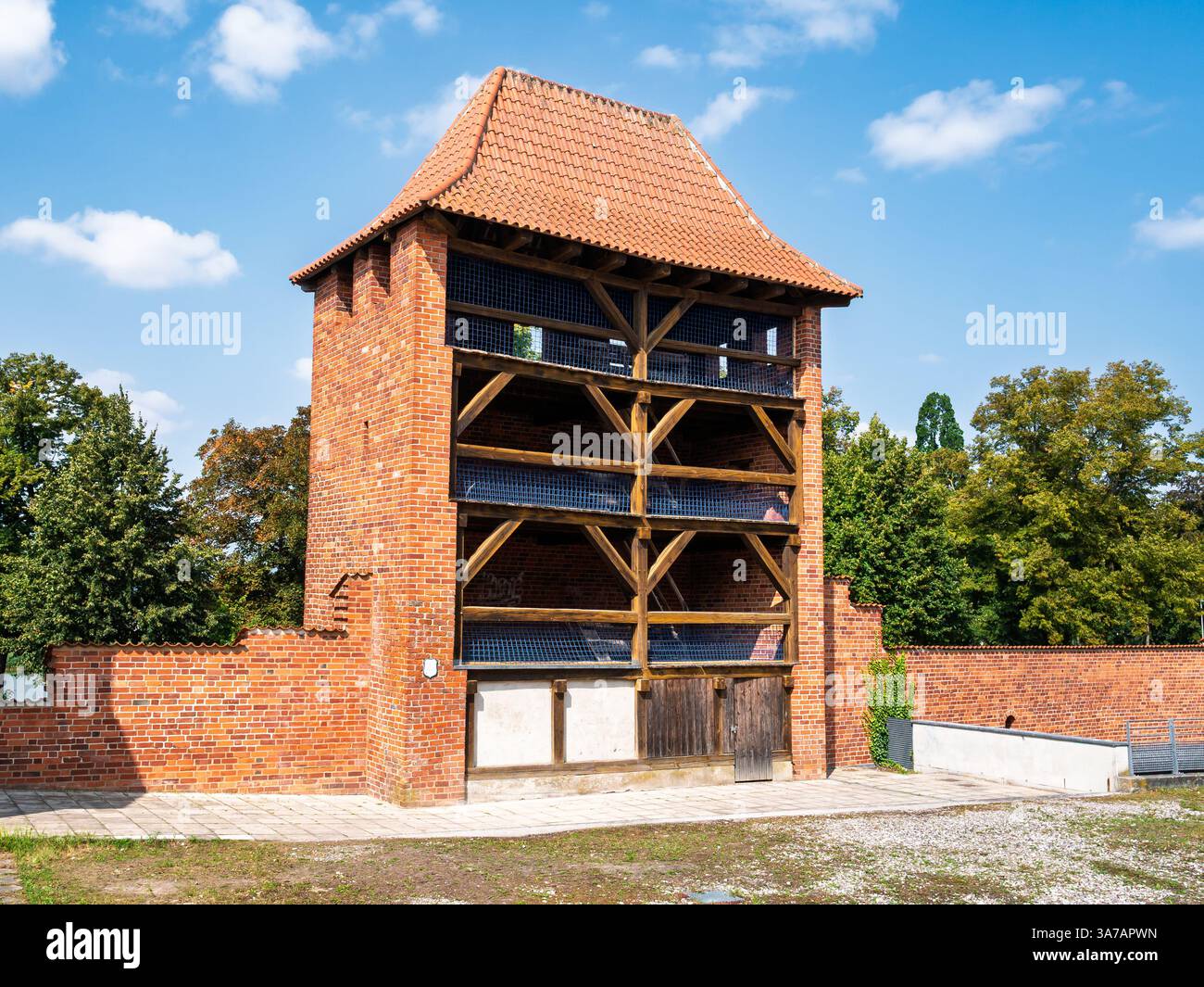 Medieval brick watchtower of historic city wall on Mühlenstrasse in old ...